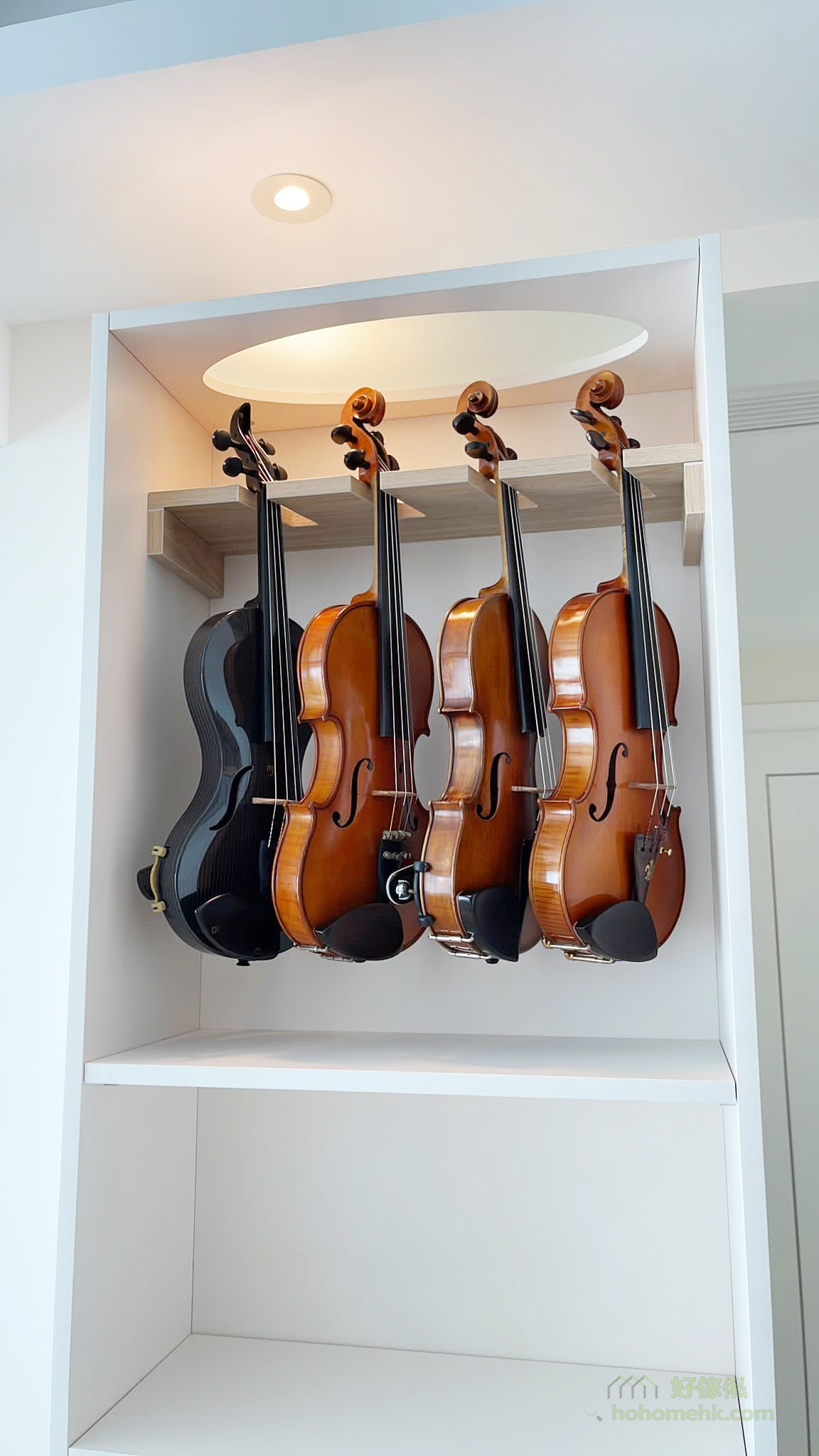 The omnipotent custom-made cabinet! The violin finally has a home ...